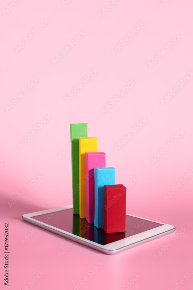 Charts made of colourful paper presenting diagram concept in real life ...
