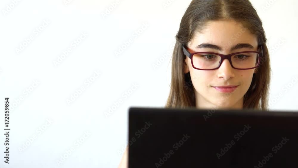 Beautiful girl with tablet computer sits on the bench in summerhouse ...