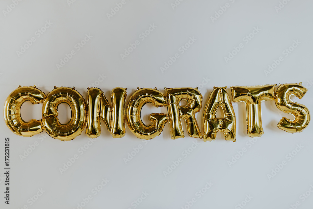 Hanging Gold Congrats Balloon Letters Stock Photo | Adobe Stock