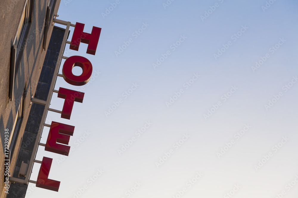 Generic Hotel Sign Attached to a Building Facade Stock Photo | Adobe Stock