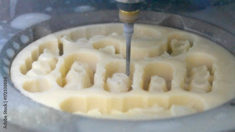 Works of the dental milling machine close-up. Processing of carving out ...