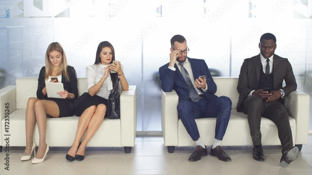 Recruitment to the company. Young applicants are awaiting interview. a ...