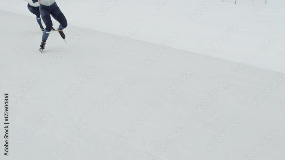 Tracking with slow motion of unrecognizable female athlete in spandex ...