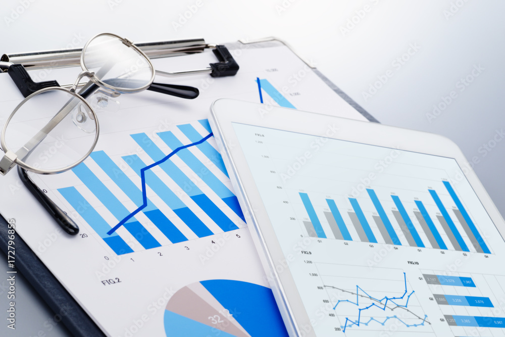 Data management. Documents and tablet computer on reflection background ...