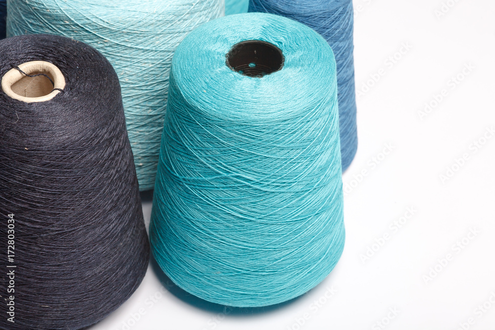 Colored cones of thread isolated on white background Stock Photo ...