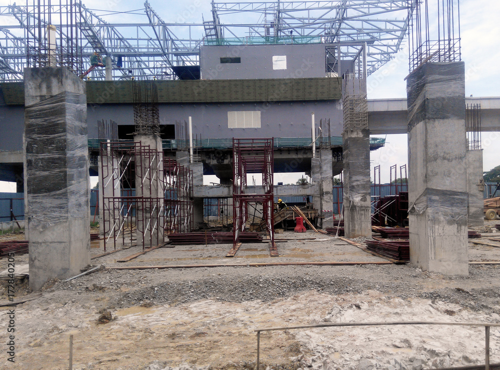 Casted concrete column at the construction site. Provided protruding ...