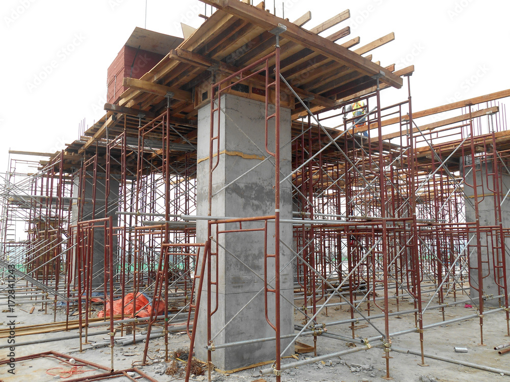 Casted concrete column at the construction site. Provided protruding ...