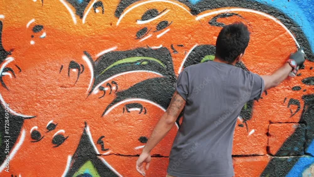 Graffiti Artist Painting With Aerosol. Man with spray bottle. Slow ...