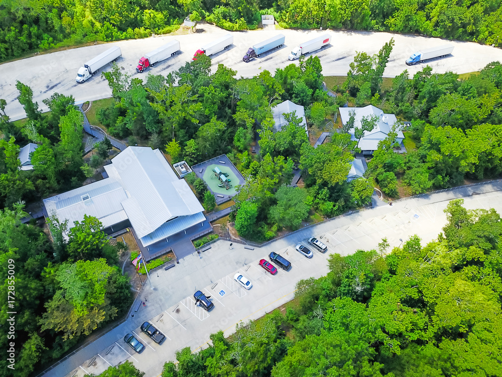 Aerial view of roadside rest area features large parking for cars ...