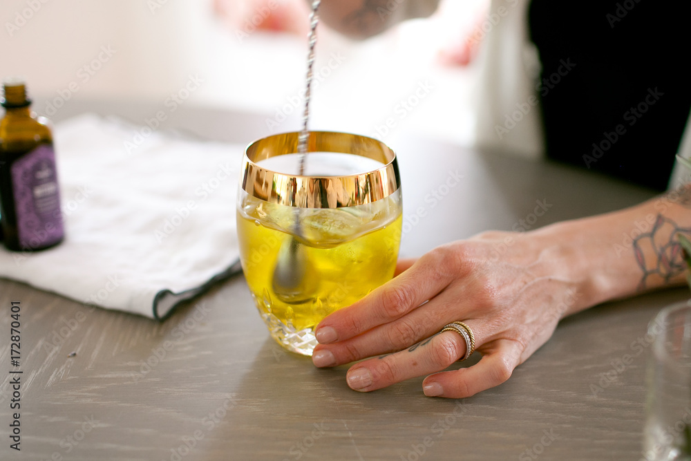Stirring drink Stock Photo | Adobe Stock