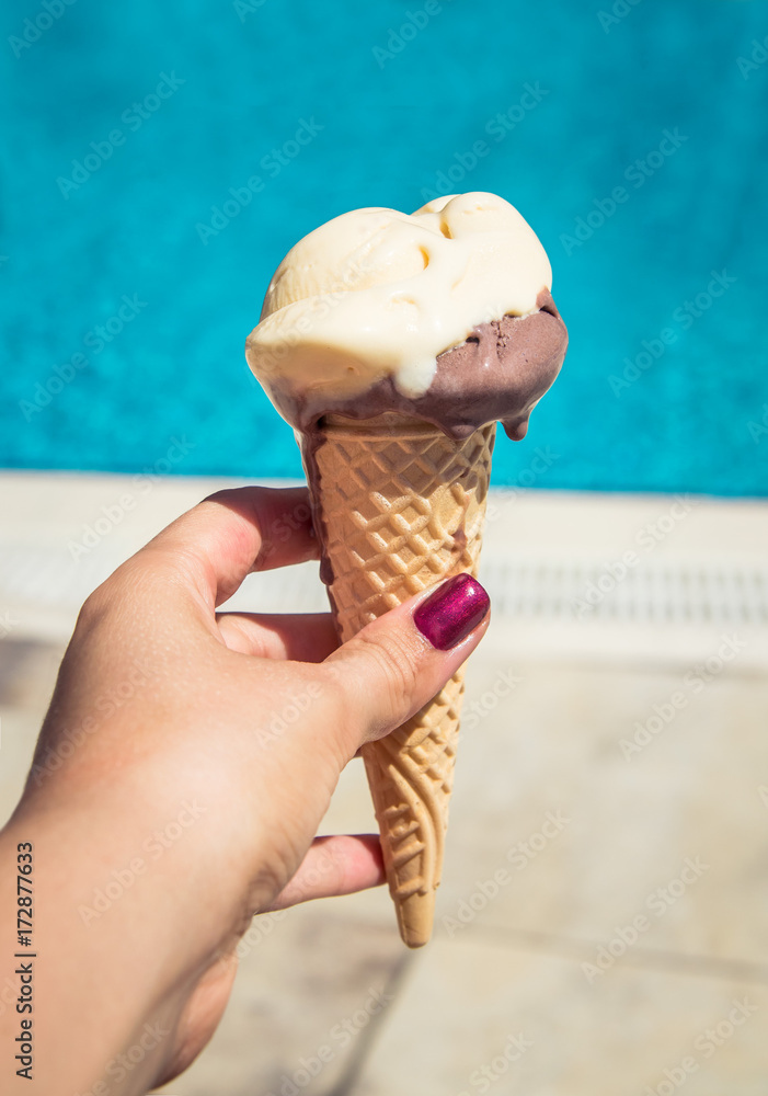 Ice-cream on swimming pool background Stock Photo | Adobe Stock