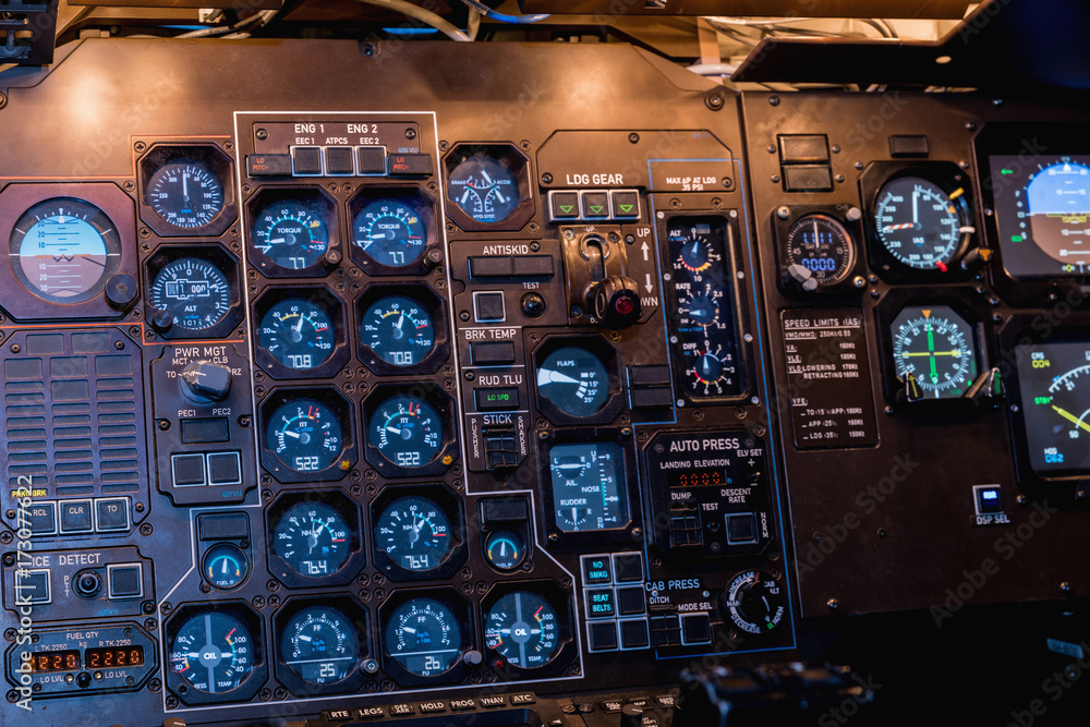 A view of the cockpit of a large commercial airplane, a cockpit trainer ...