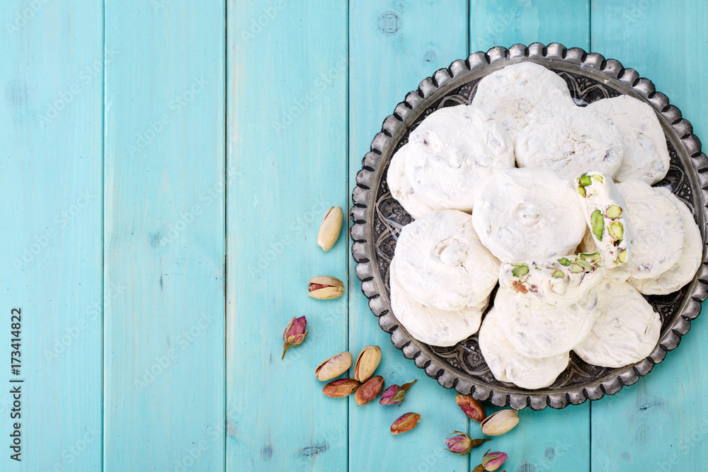 Shot from top Traditional Iranian and Persian pieces of white nougat ...