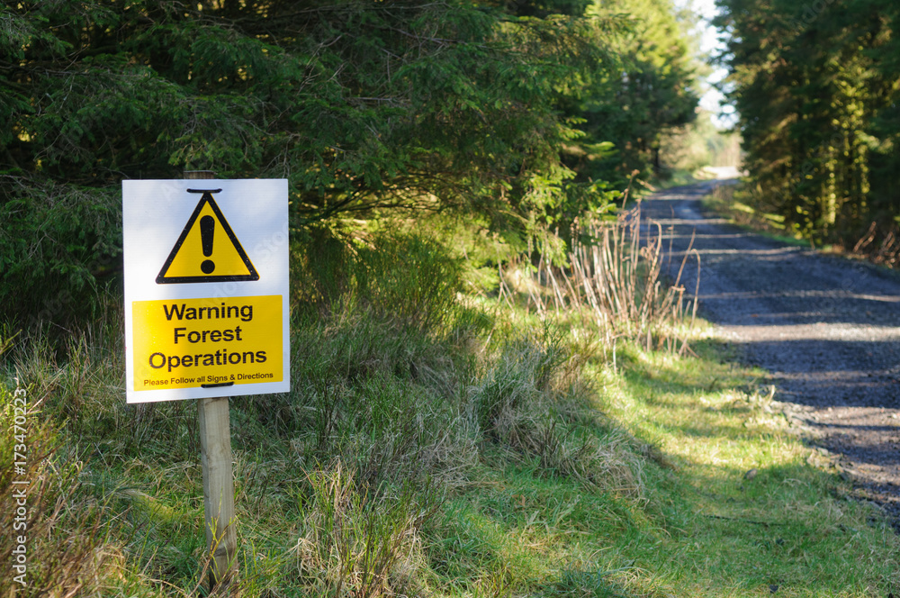Sign in a forest "Warning, Forest Operations" Stock Photo | Adobe Stock
