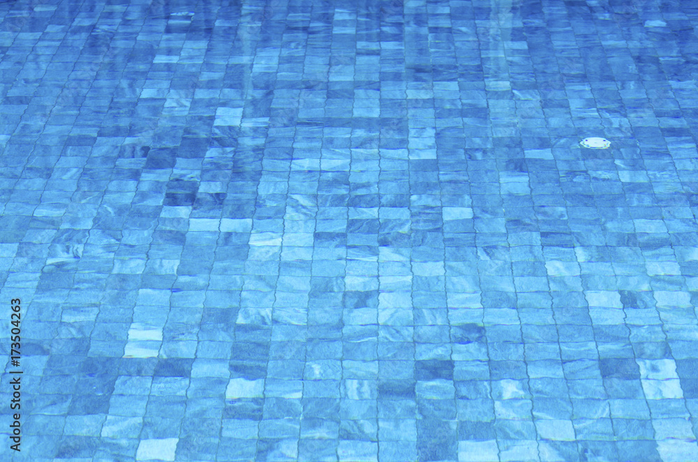 Below the pool is a blue tile and flowing with a wave background. Stock ...