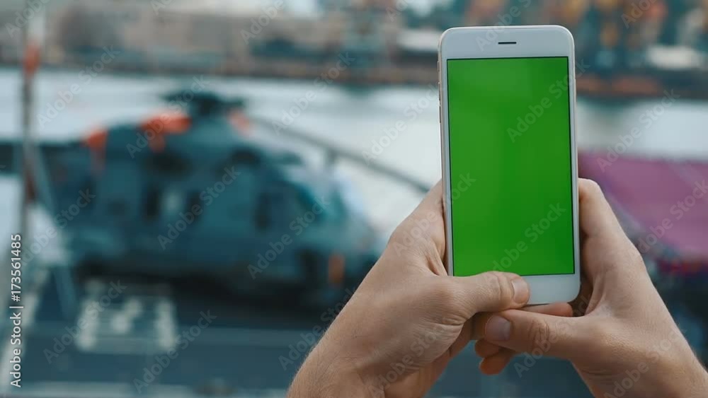 Vidéo Stock Closeup man hands holding using modern white smart phone mobile green screen ...