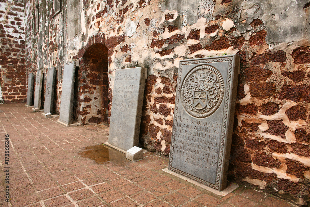 Tombstones display the colourful past of the UNESCO World Heritage site ...