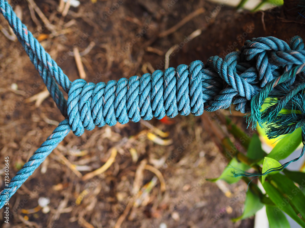 Blue green grainy texture big manila rope swirl spiral long knot tie ...