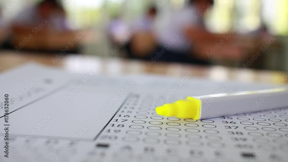 Pencil on multiple-choice quizzes or testing exams answer sheets ...