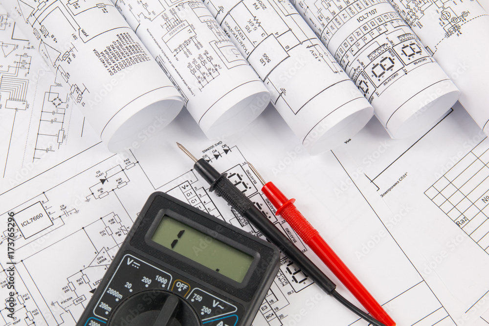 electrical engineering drawings and digital multimeter Stock Photo ...