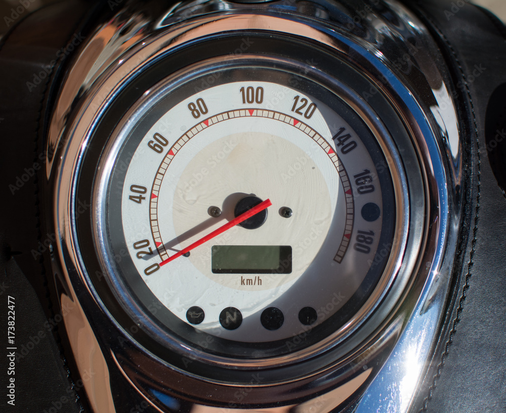 Motorcycle gauge and instrument cluster photographed from close ...
