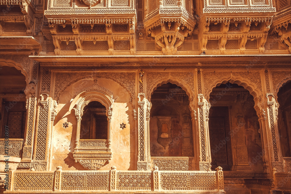 Entrance to historical indian house with ancient design of walls and ...