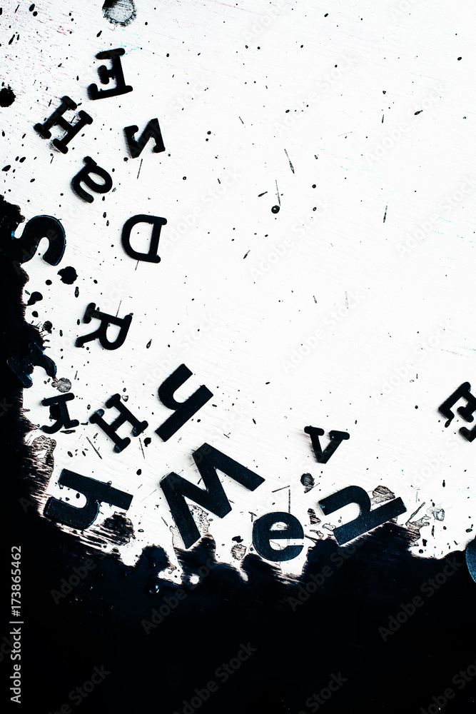 Foto de Scattered letters in blurring spilled ink. Creative writing ...