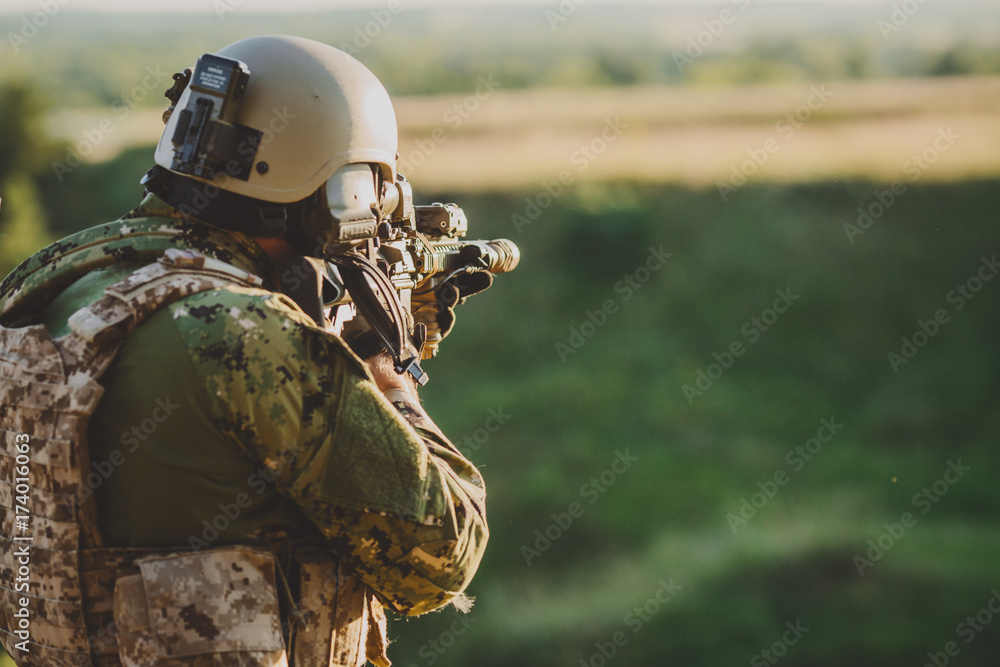 Infantry soldier shooting during military combat training. Stock Photo ...