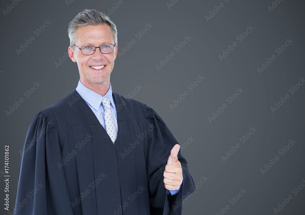 Male judge thumbs up against grey background Stock Photo | Adobe Stock