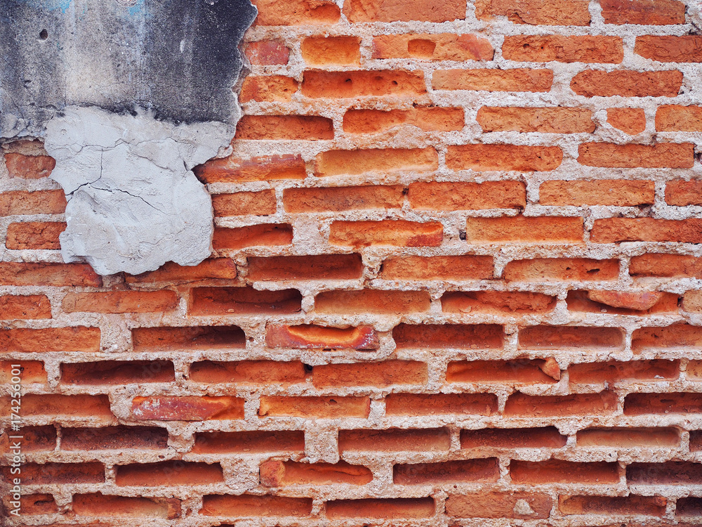 Foto de Old weathered crushed broken red long brick wall background ...