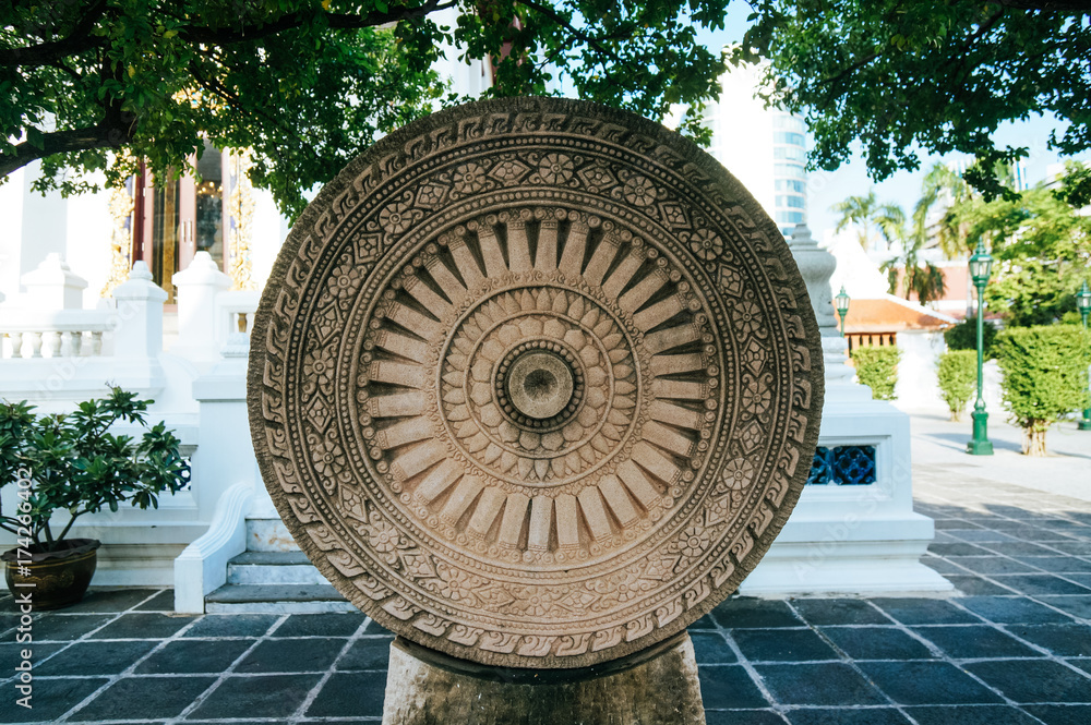 close up Wheel of Dhamma or Wheel of life , Symbol of Buddhism in the ...