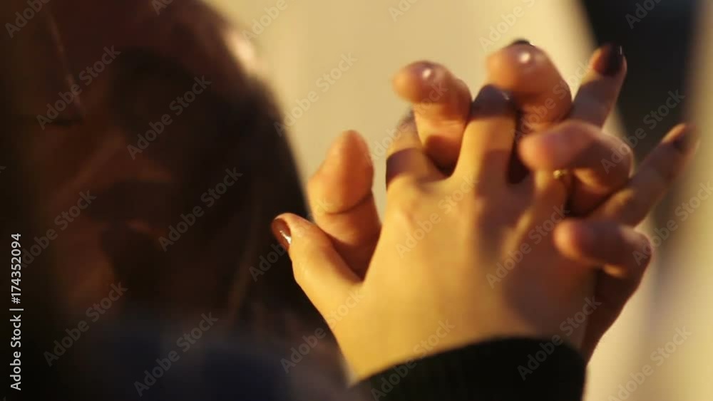 handshake of the enamored guy and girl. handshake of the enamored guy ...