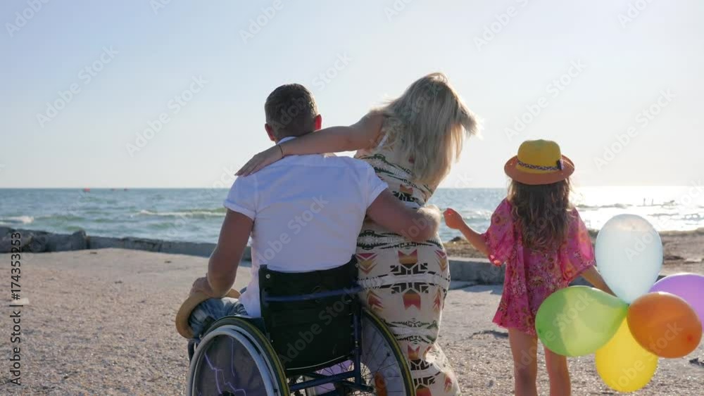 invalid parents with child, mom, dad disabled and daughter holding each ...