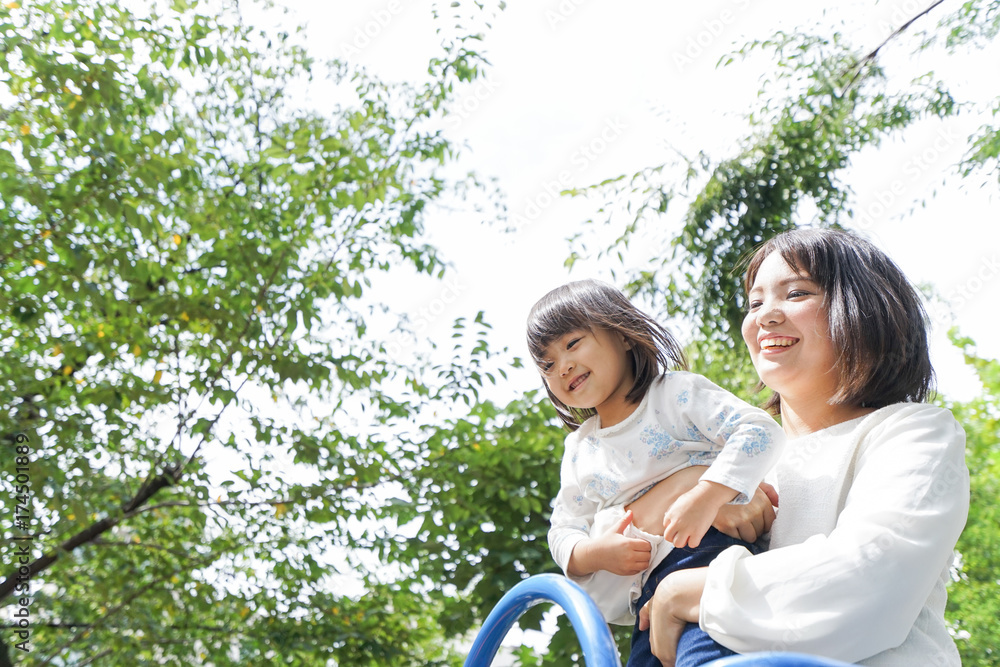Mother hugging child Stock Photo | Adobe Stock