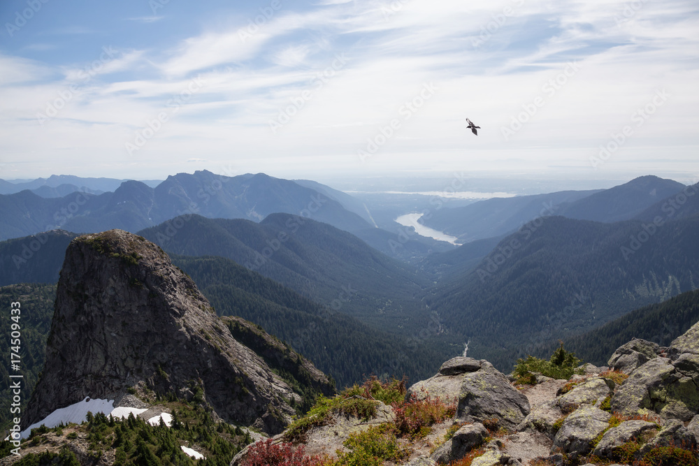 Beautiful landscape view of mountain top, valley, and Capilano Lake ...