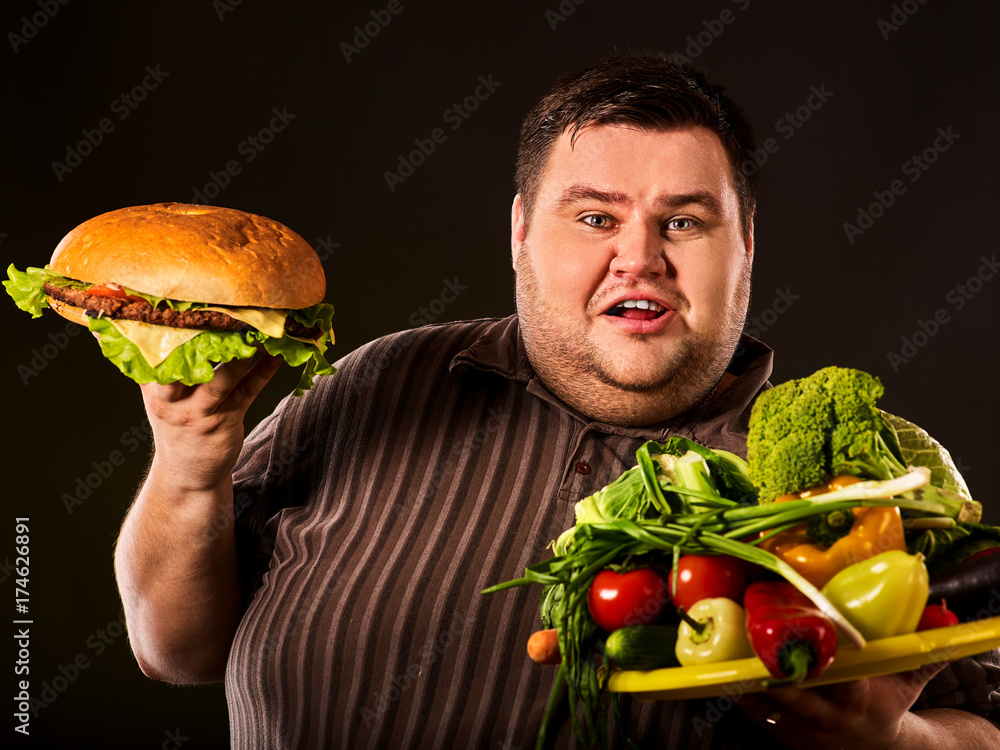 Diet fat man who makes choice between healthy and unhealthy food ...