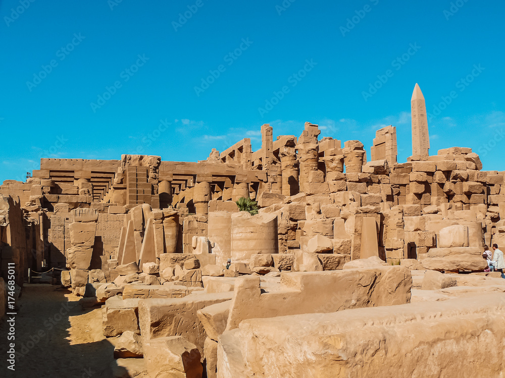 Poster Egyptian Obelisk in the Karnak Temple in the middle of Ruins of ...