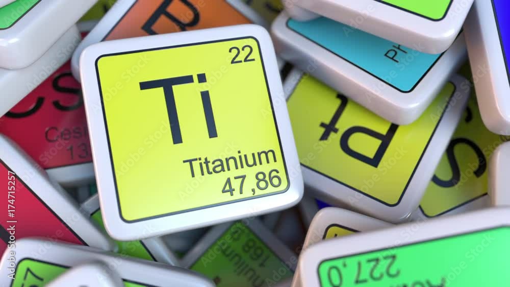 Titanium block on the pile of periodic table of the chemical elements ...