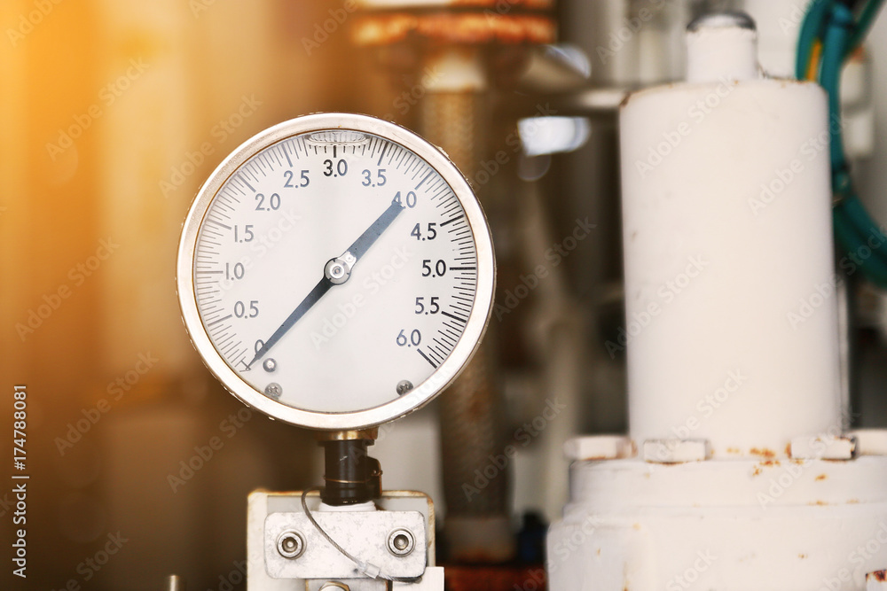 Pressure gauge using measure the pressure in production process. Worker ...