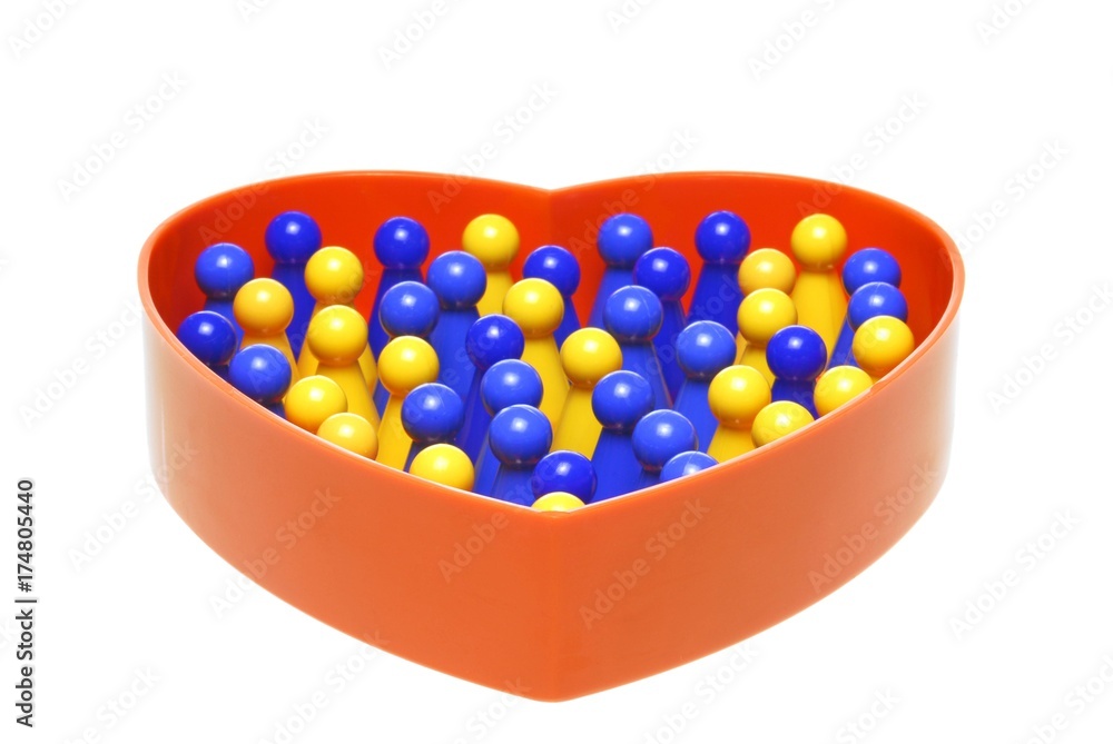 Heart-shaped container with meeples in two colours, symbolic image of ...
