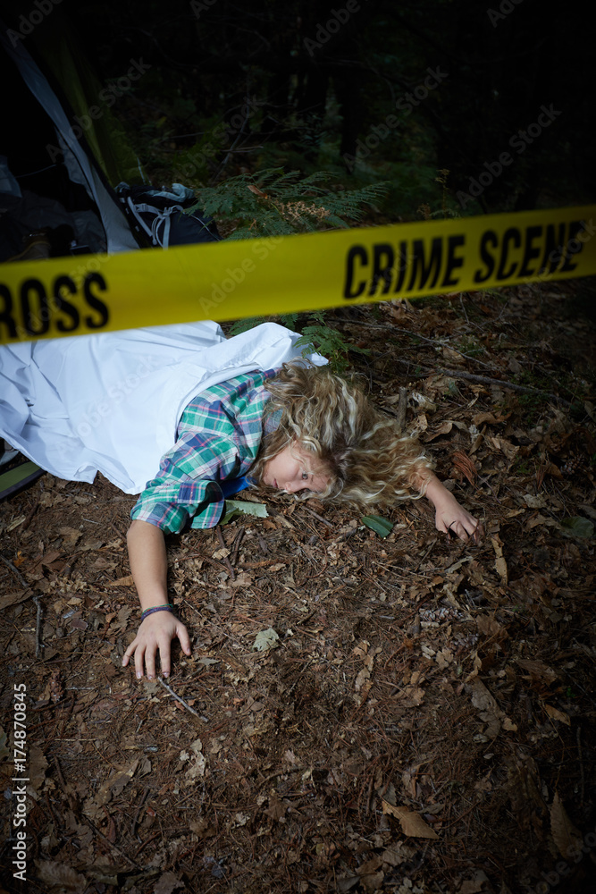 crime scene, woman playing dead, lying on the ground Stock Photo ...