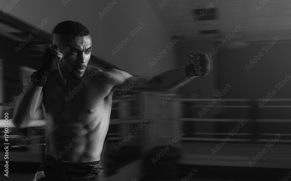 African american male boxer. Side view, muscular man boxing on ...