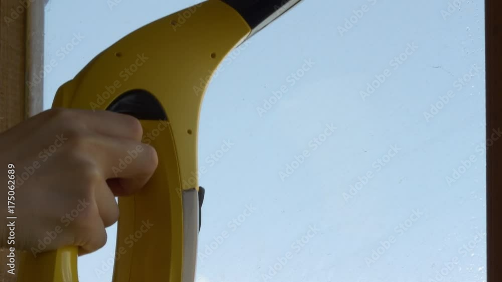 Woman's Hand Cleaning A Window On The Balcony Stock Video | Adobe Stock