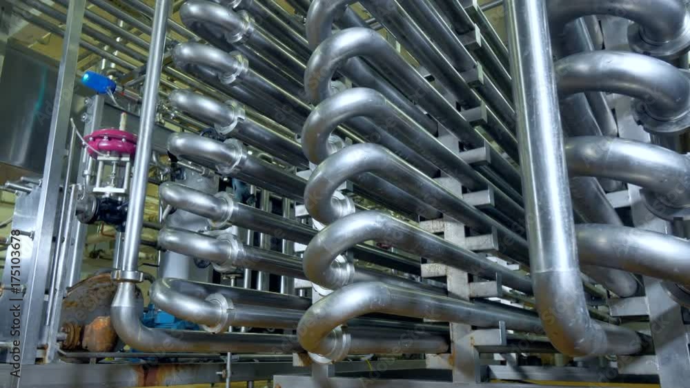 Curved steel pipes at a industrial plant. Stock Video | Adobe Stock