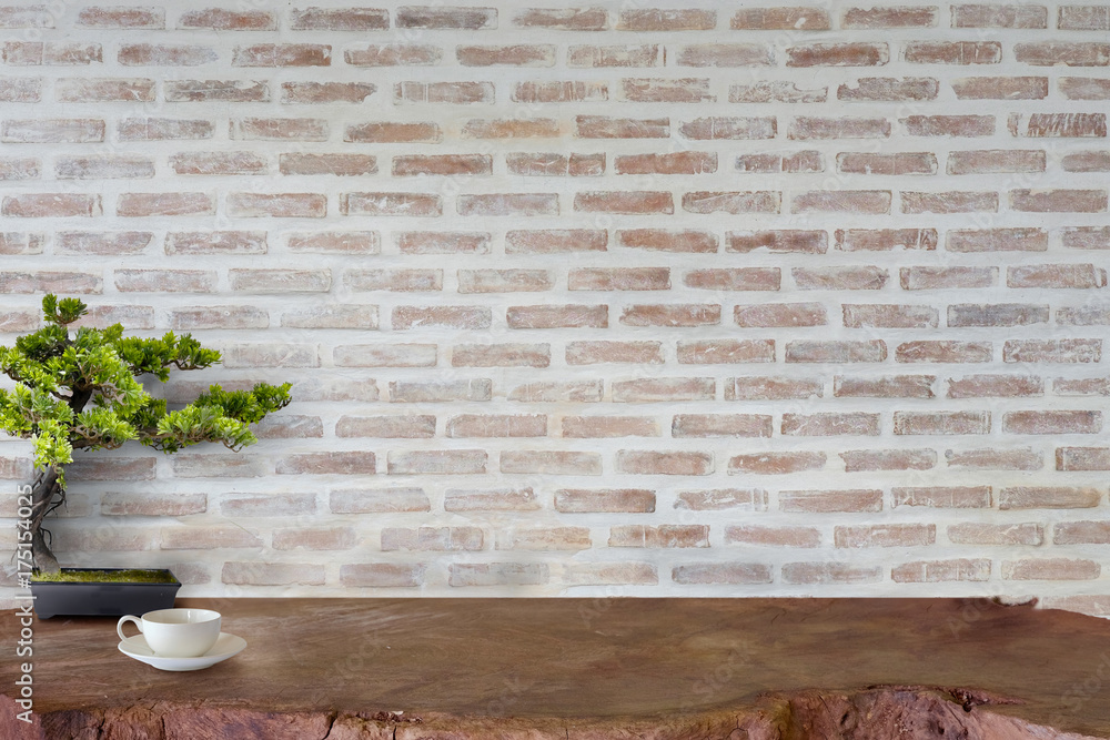 Mock up wooden table with white brick wall. For product display montage ...