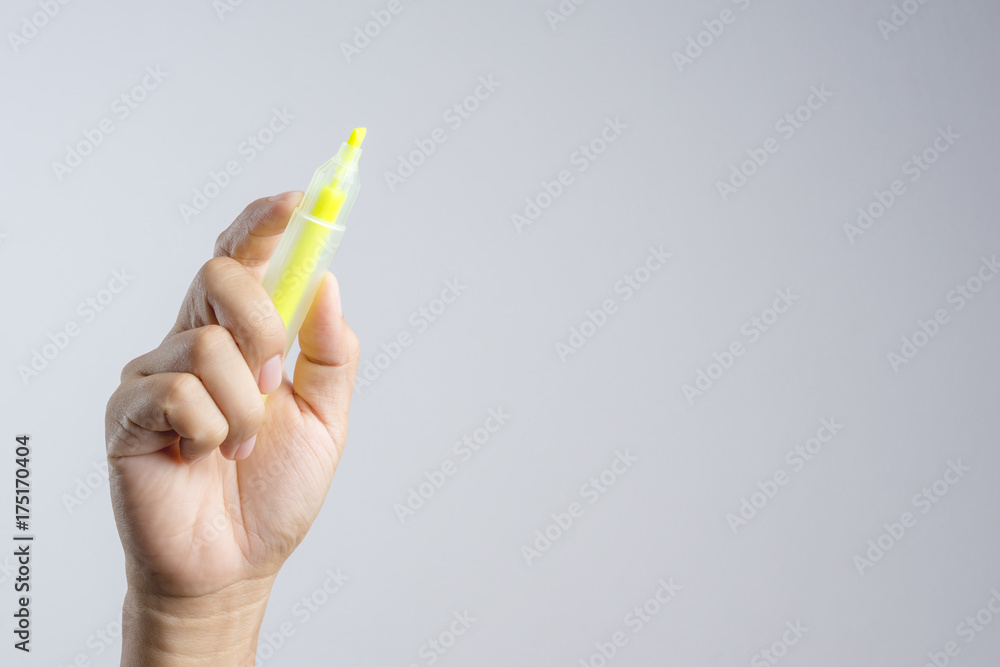 Hand holding Yellow highlighter for writing a color word marker Stock ...