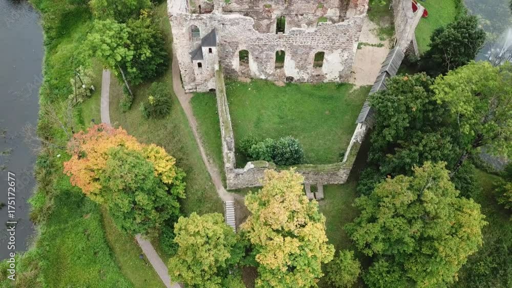 ruins of an ancient medieval castle Dobele Latvia Aerial drone top view ...