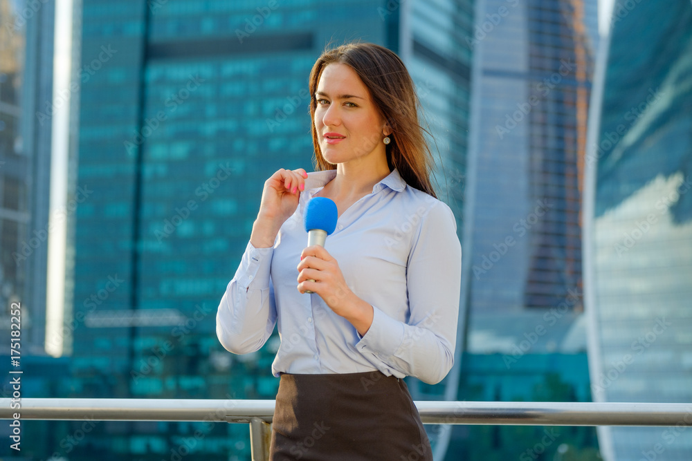 Young girl TV reporter is broadcasting on modern city background Stock ...
