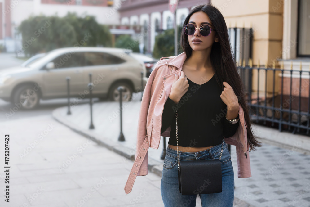 Fashion style portrait of young beautiful calm female model posing at ...