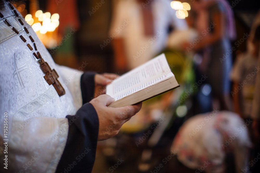 Priest Holding A Bible. Orthodox christian priest reading church book ...